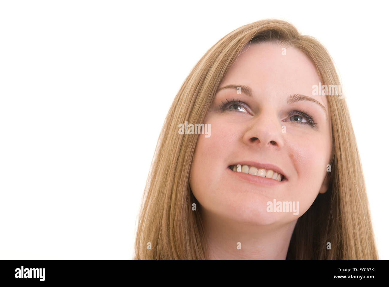 Attractive woman looking up Stock Photo - Alamy