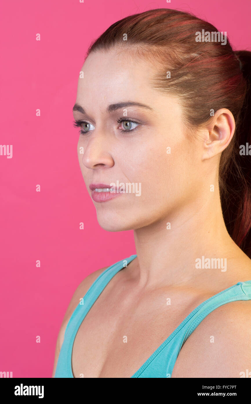 Contemplative woman looking away Stock Photo - Alamy