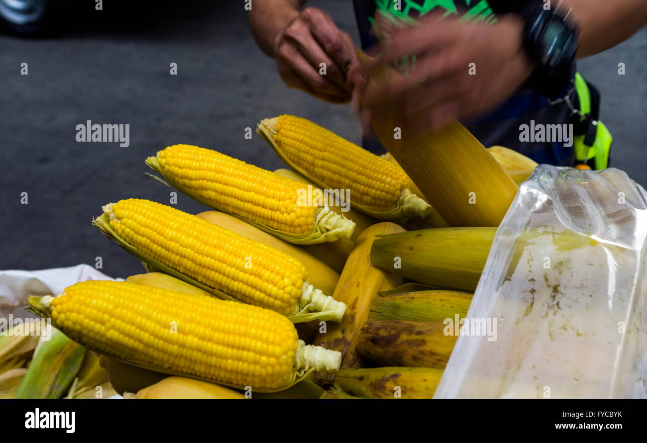 Corns for sale on Manila streets in Philippines Stock Photo - Alamy