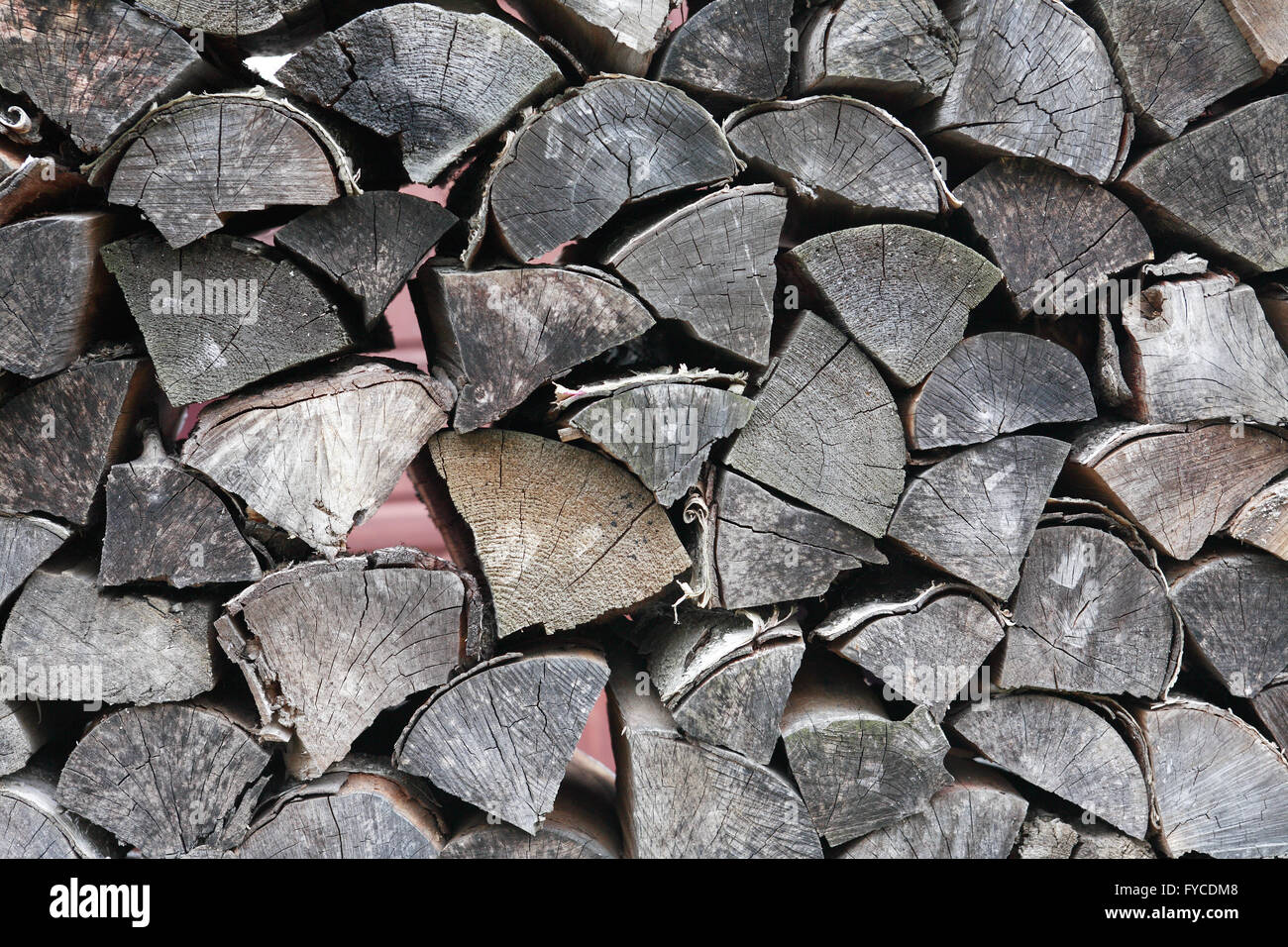 Closeup of gray dry fire-wood. Farm background Stock Photo - Alamy