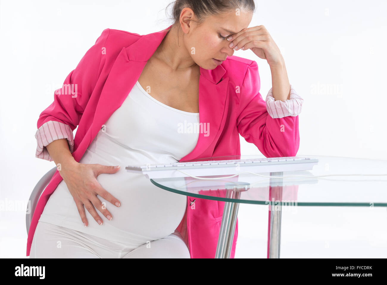 PREGNANT WOMAN AT WORK Stock Photo - Alamy