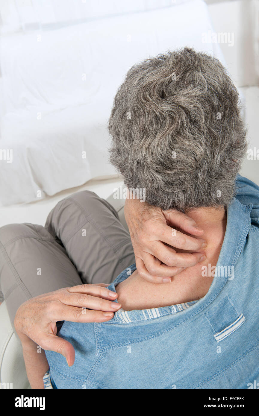 Itching elderly person hi-res stock photography and images - Alamy