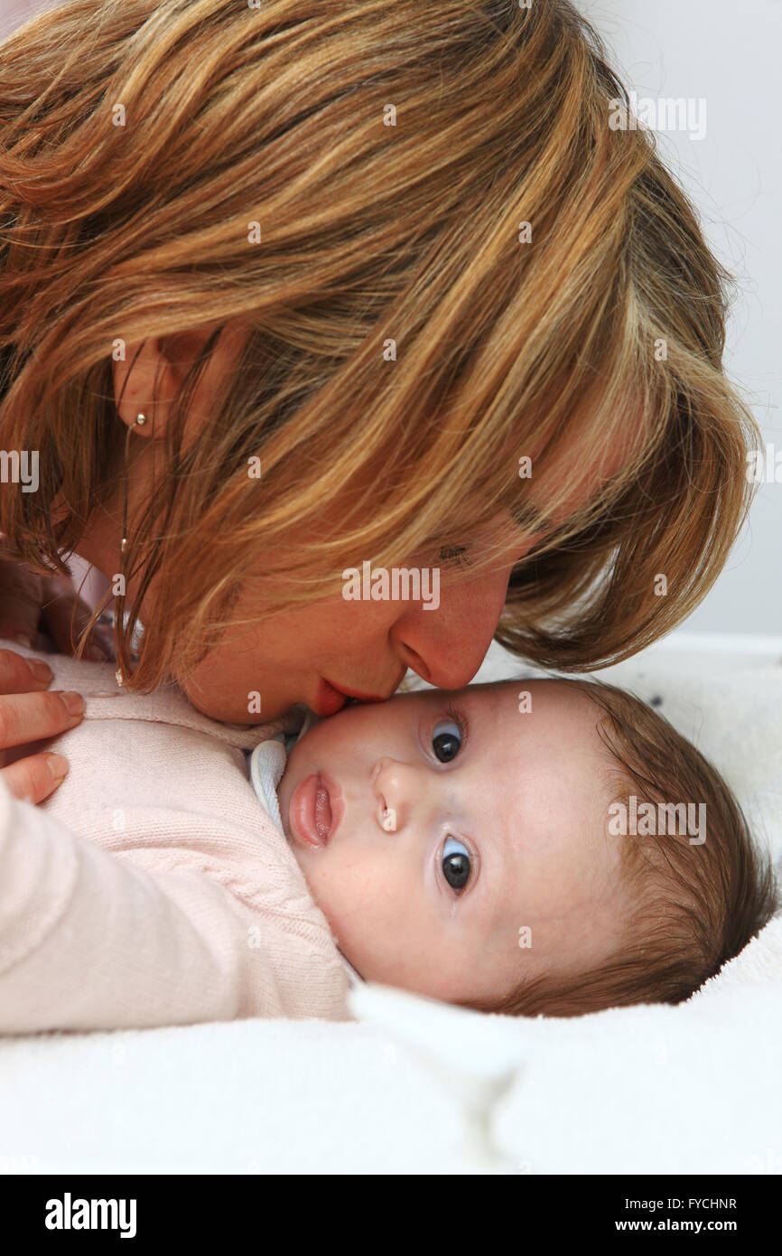 Caring for infant hi-res stock photography and images - Alamy