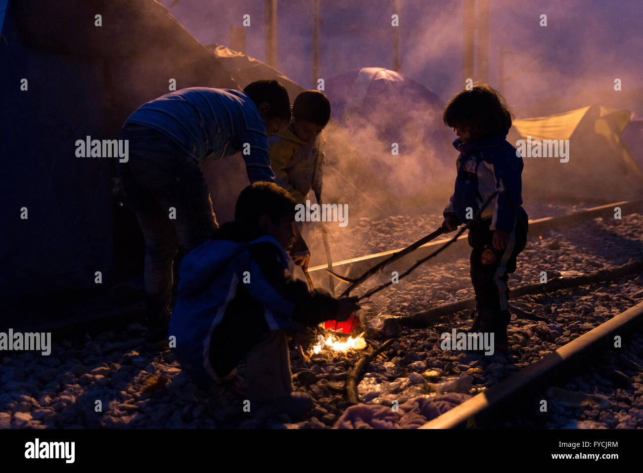 Refugee camp fire hi-res stock photography and images - Alamy