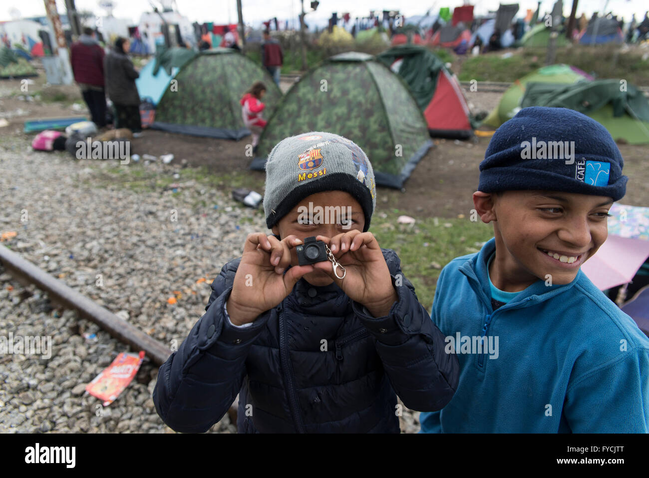 Refugee children playing toys hi-res stock photography and images - Alamy
