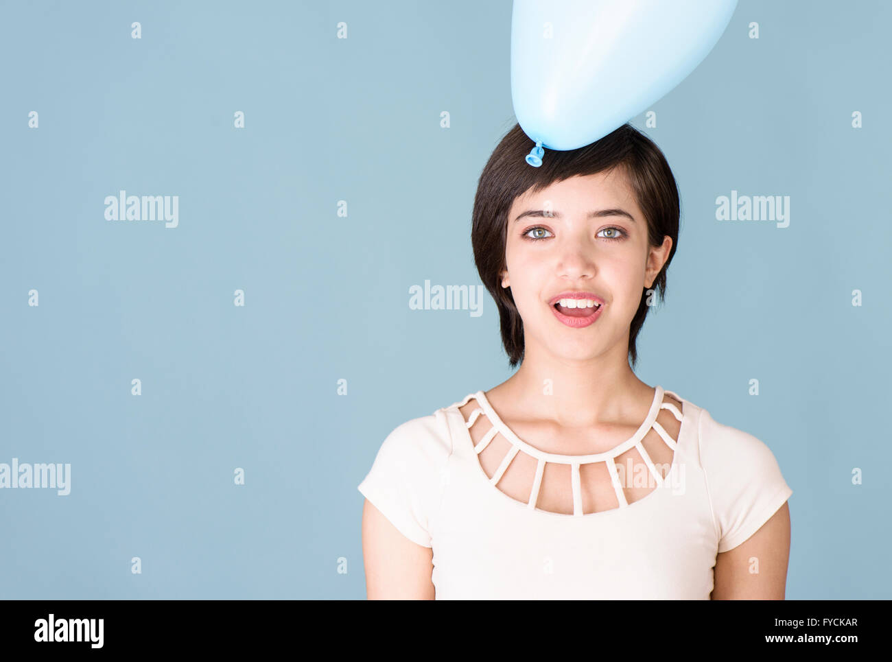 Woman blue balloon hi-res stock photography and images - Alamy