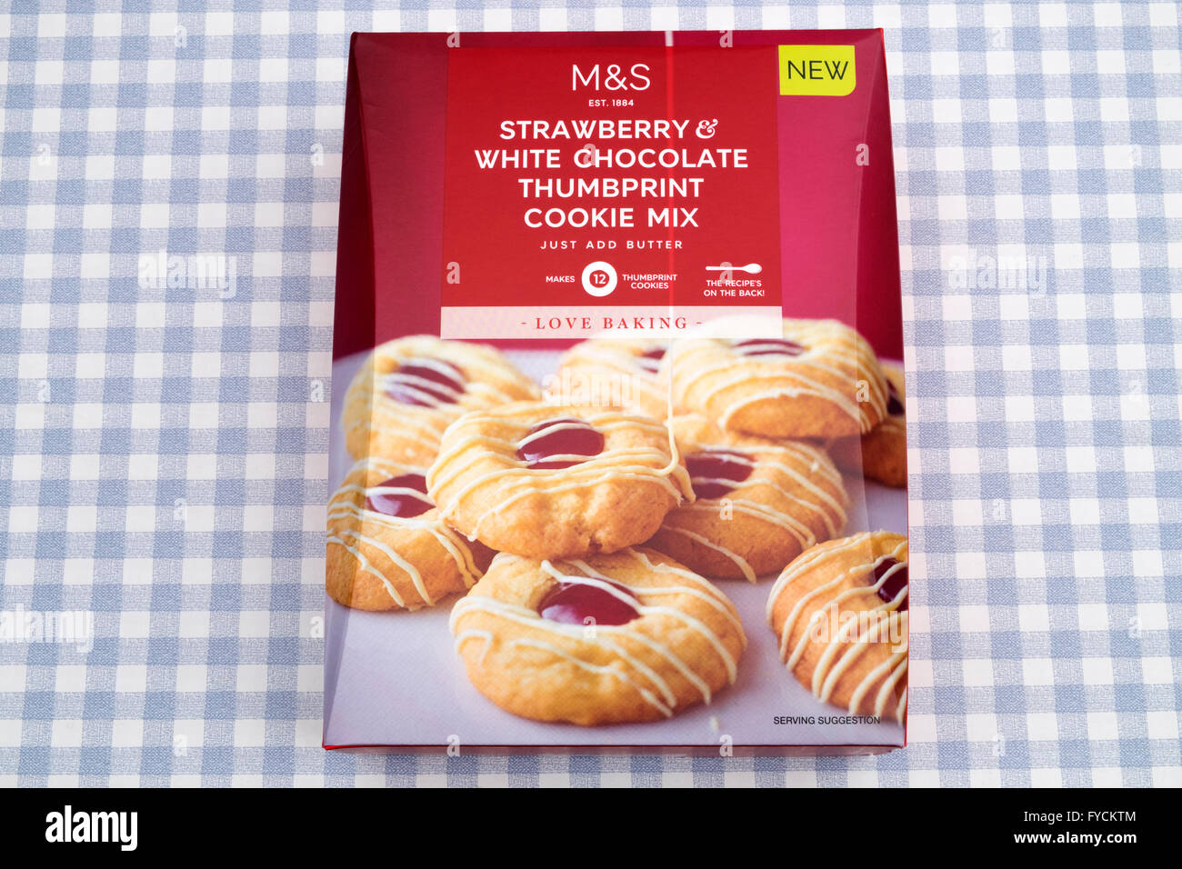 M&S strawberry & white chocolate thumbprint cookie mix Stock Photo - Alamy