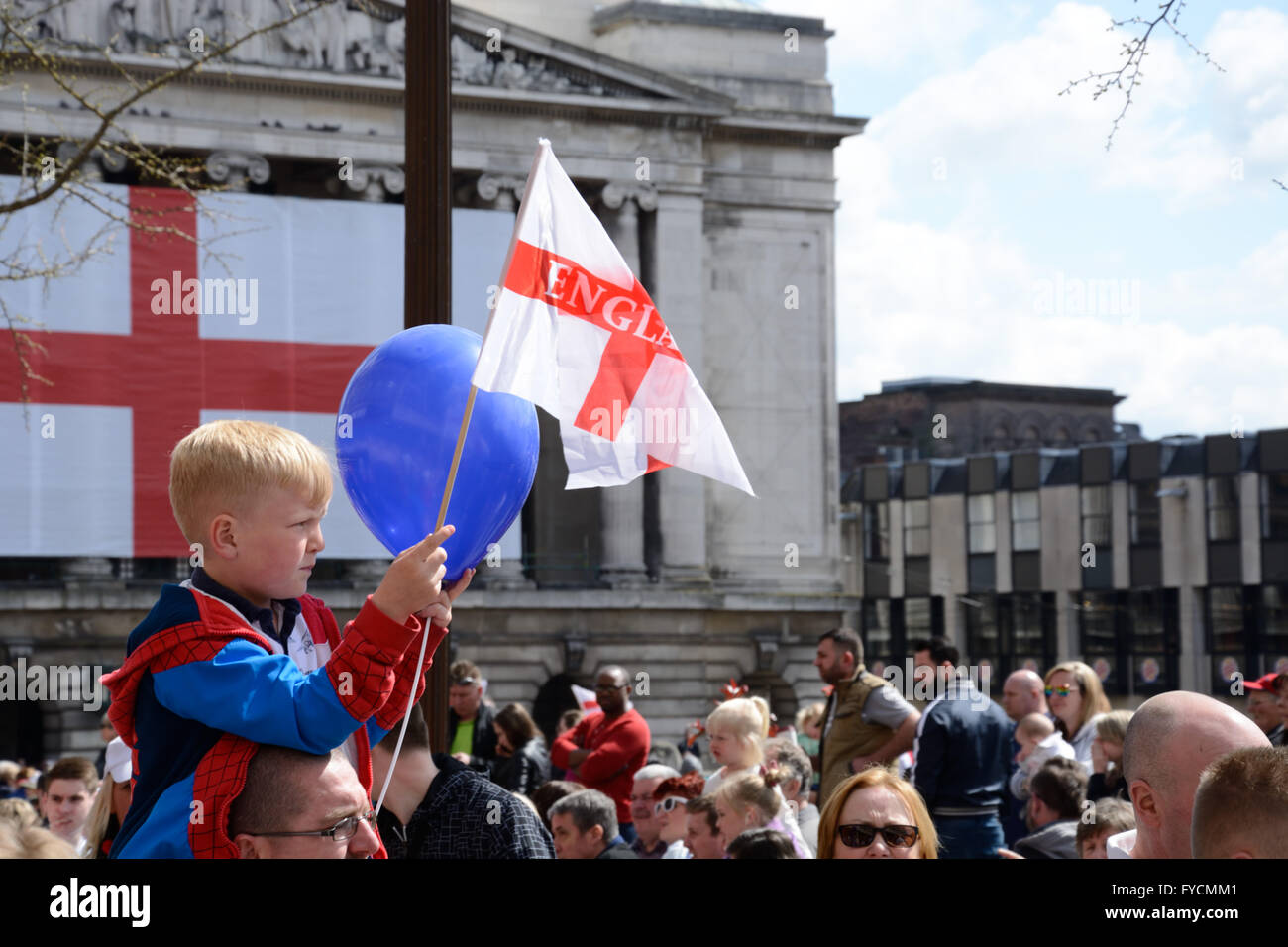 Young boy carried on Dad's shoulders at St. George's day parade Stock ...