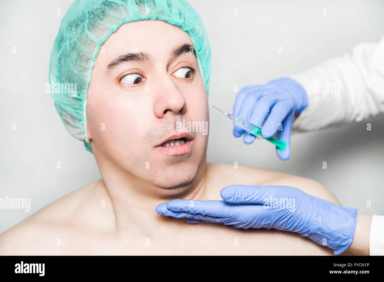 Doctor aesthetician makes face beauty injections to male patient Stock ...