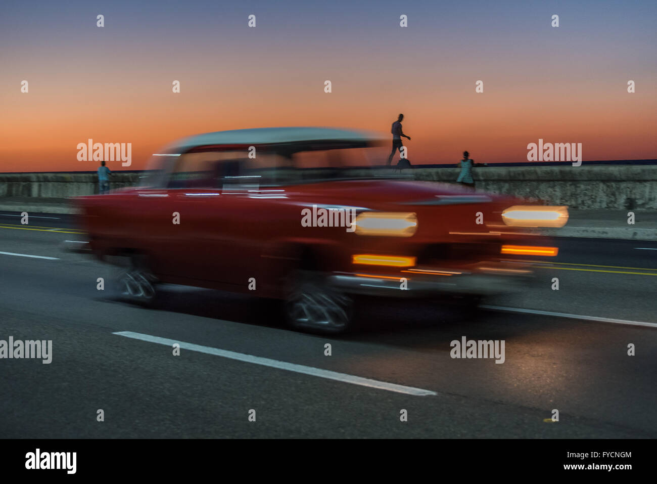 Vibrant bright red beautifully maintained classic American car with ...