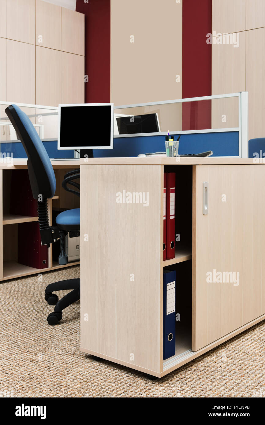 computers behind the glass in a modern office Stock Photo - Alamy