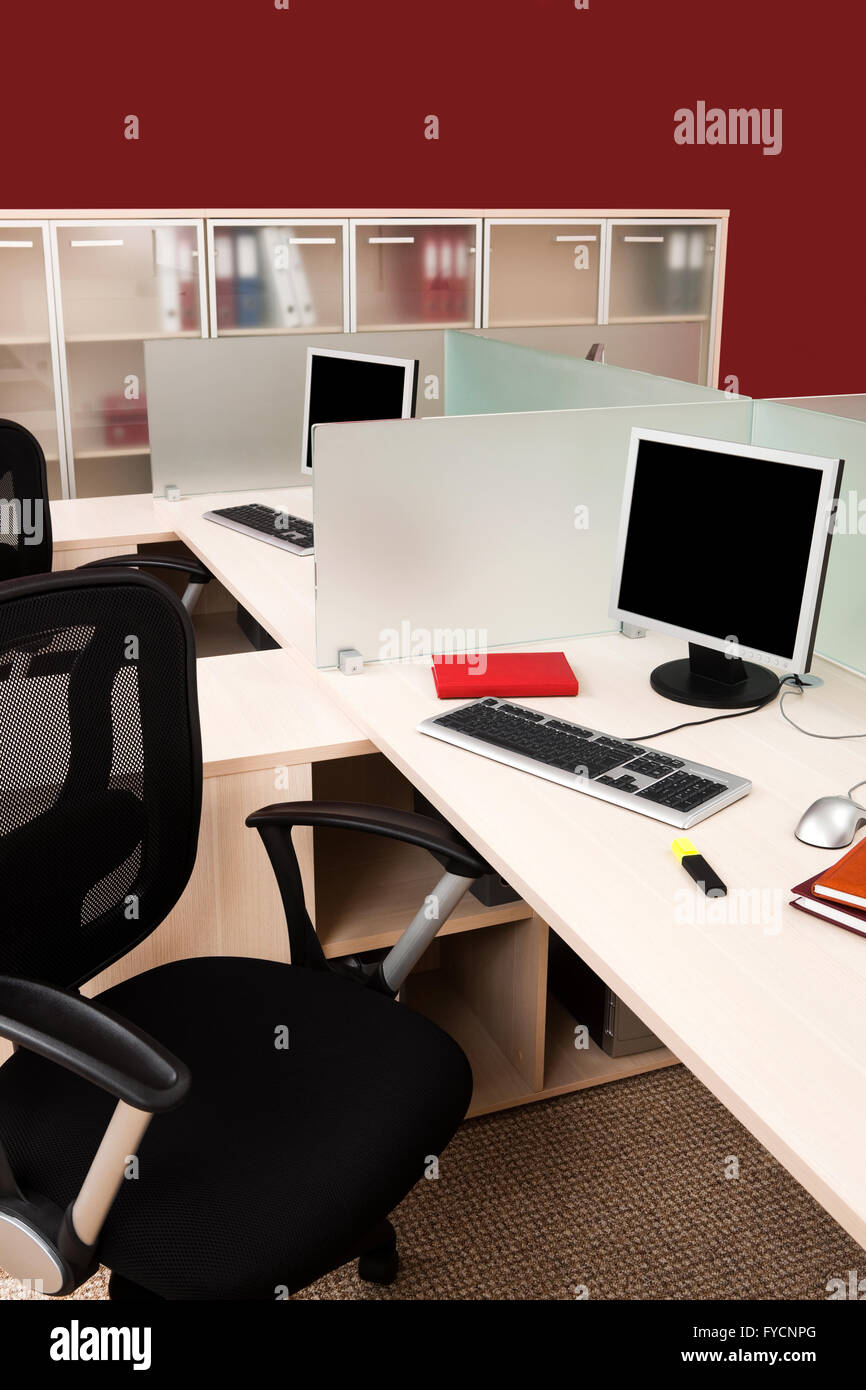 computers behind the glass in a modern office Stock Photo - Alamy