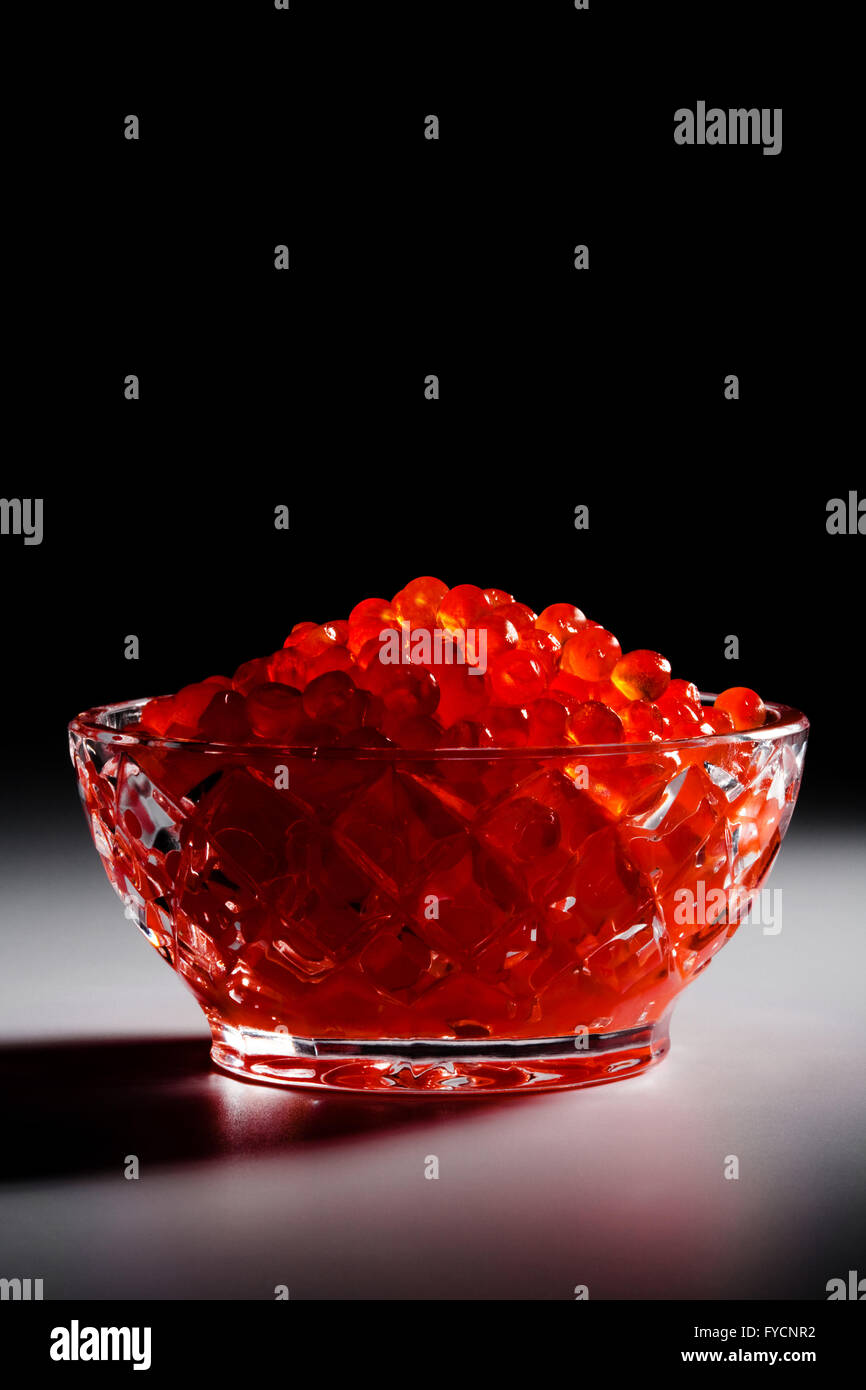 Fresh red caviar in beautiful crystal utensils Stock Photo - Alamy