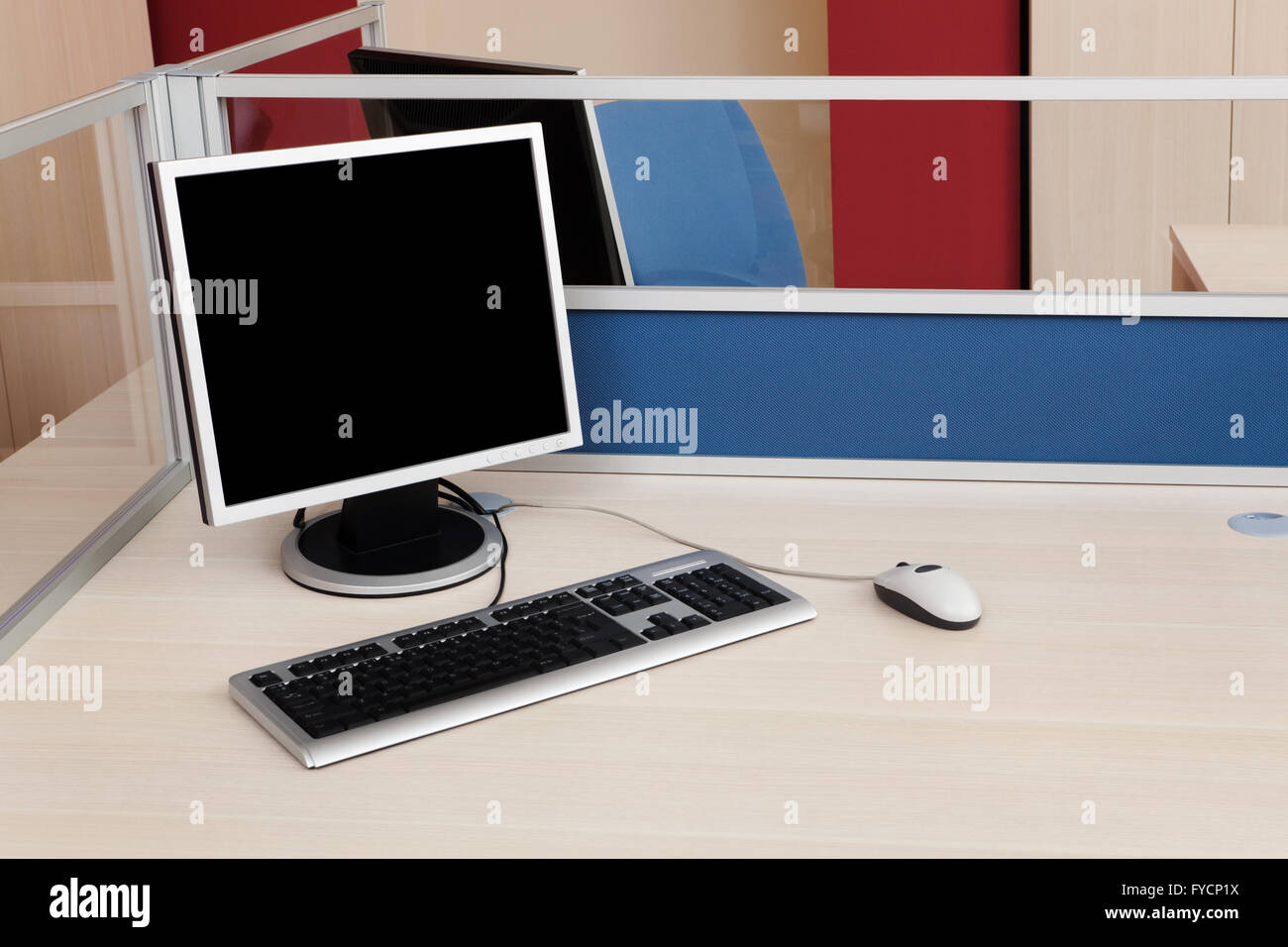 computers behind the glass in a modern office Stock Photo - Alamy