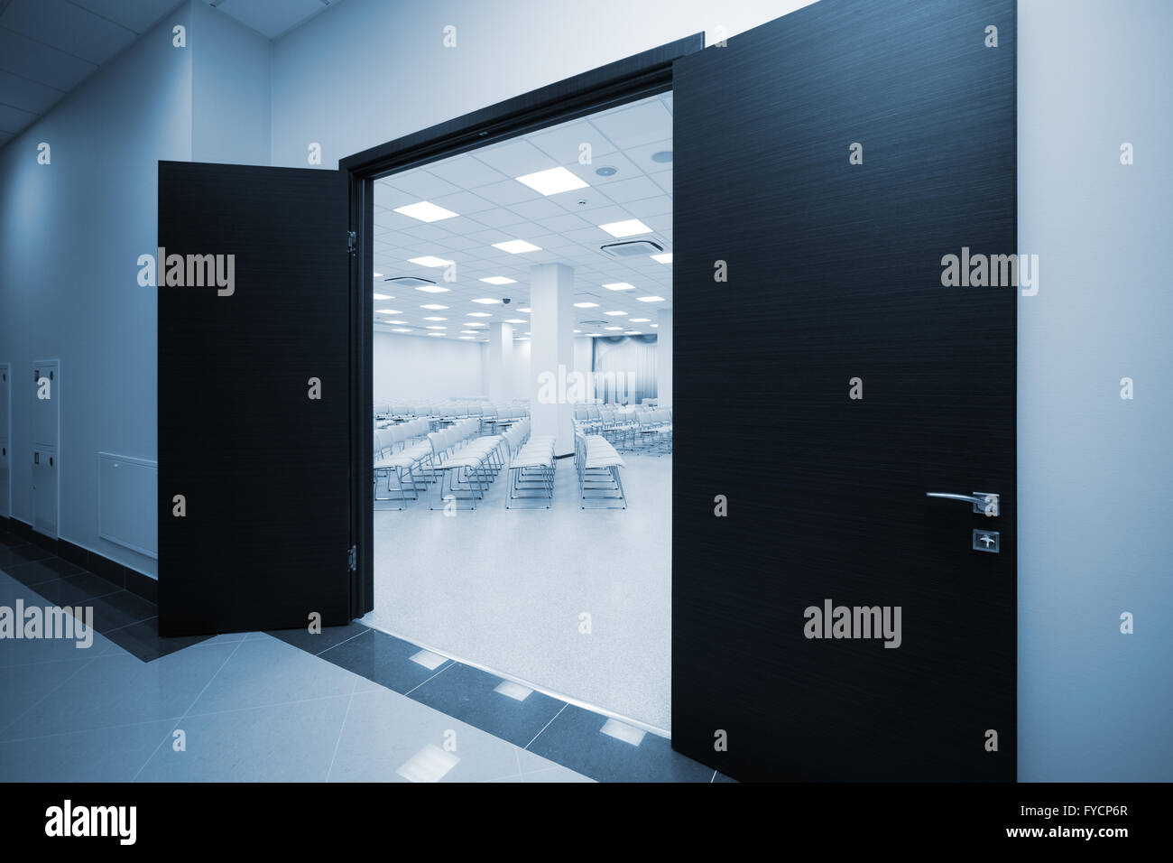 entrance into a large and a white auditorium Stock Photo - Alamy