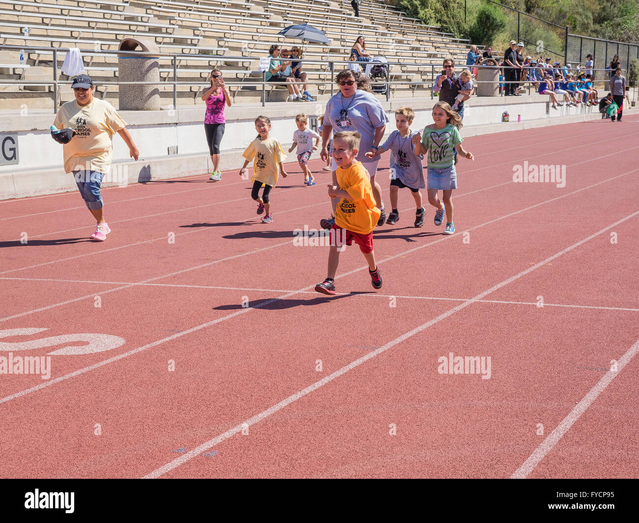 Disabled elementary school kids race in the 50 meter race at the ...
