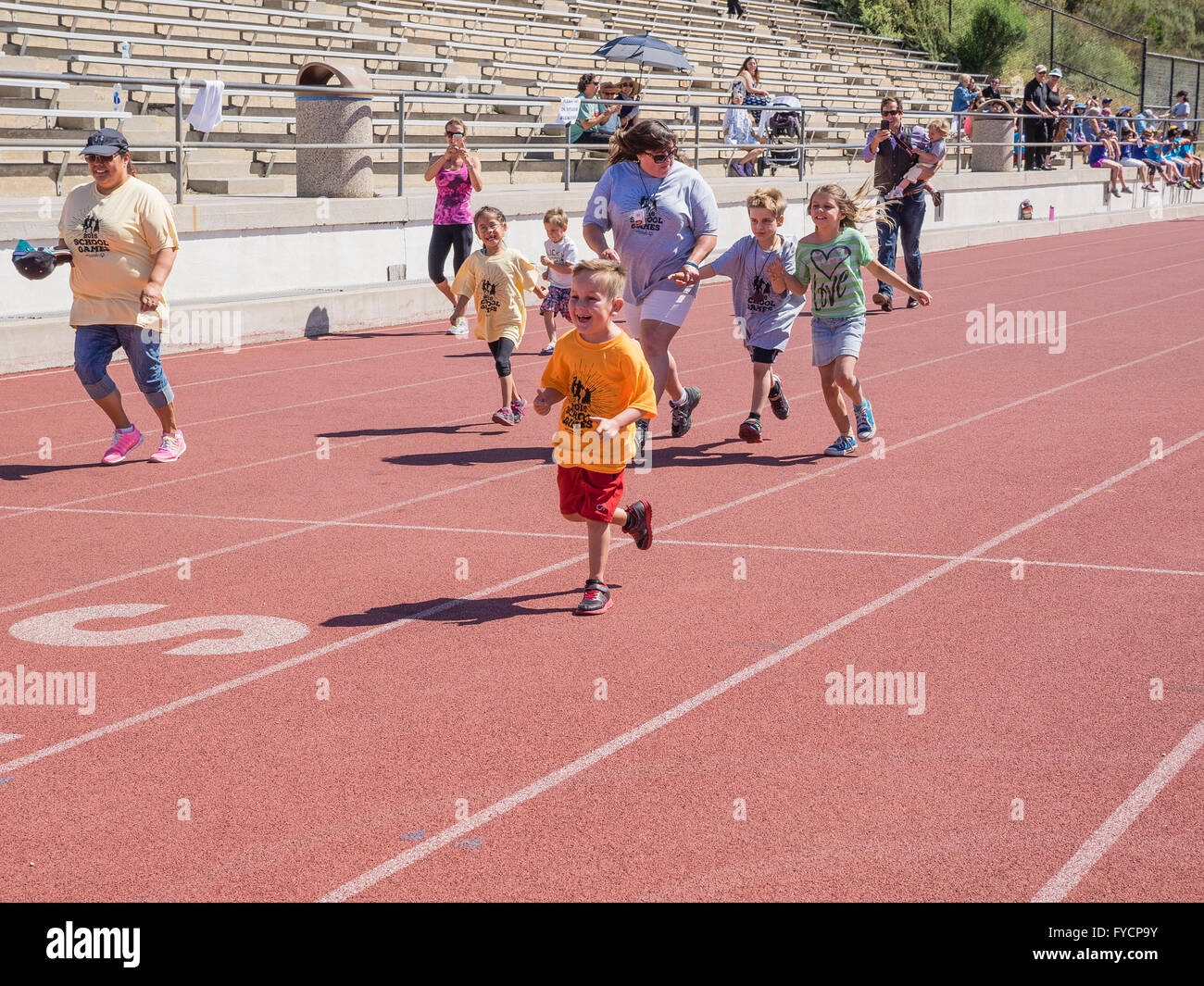 Disabled elementary school kids race in the 50 meter race at the ...