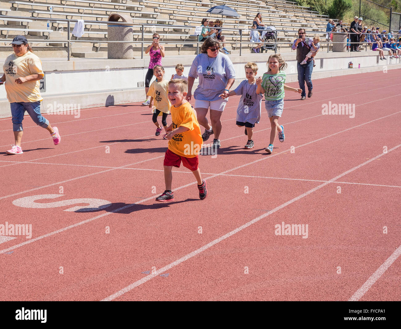 Disabled elementary school kids race in the 50 meter race at the ...