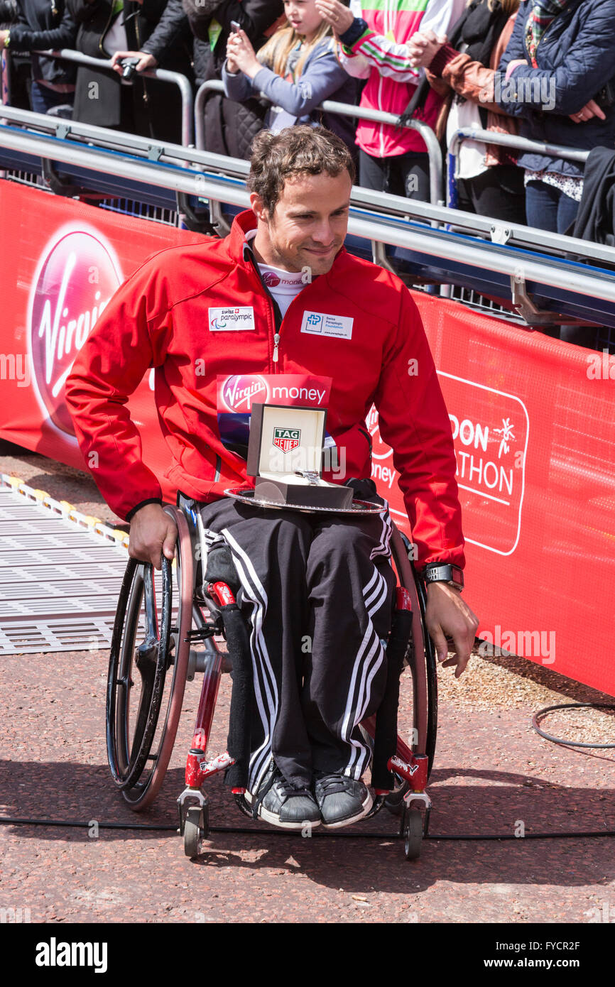London, UK. 24 April 2016. Marcel Hug (SUI), winner of the wheelchair ...