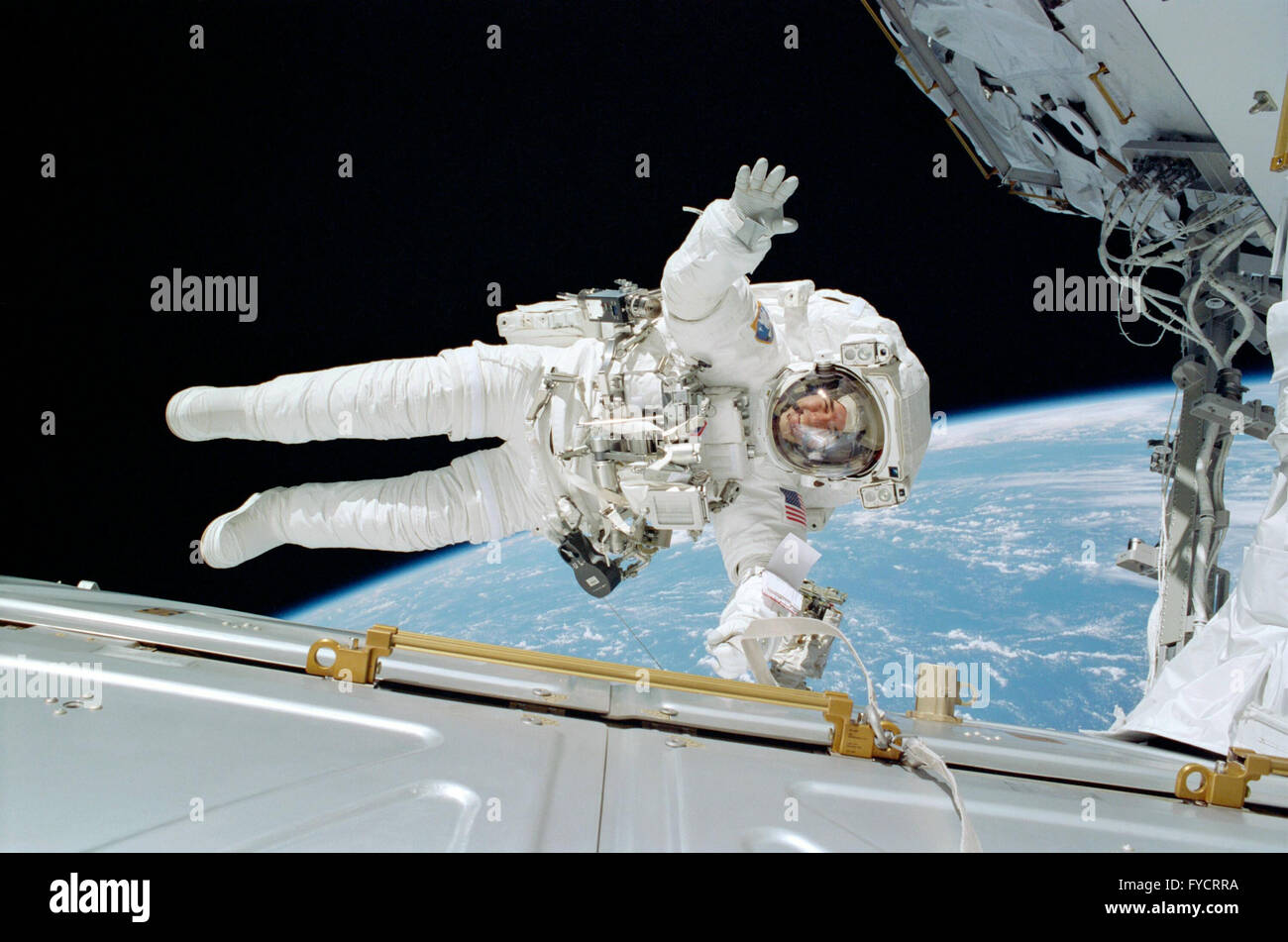 NASA astronaut Rex J. Walheim attached to the International Space ...