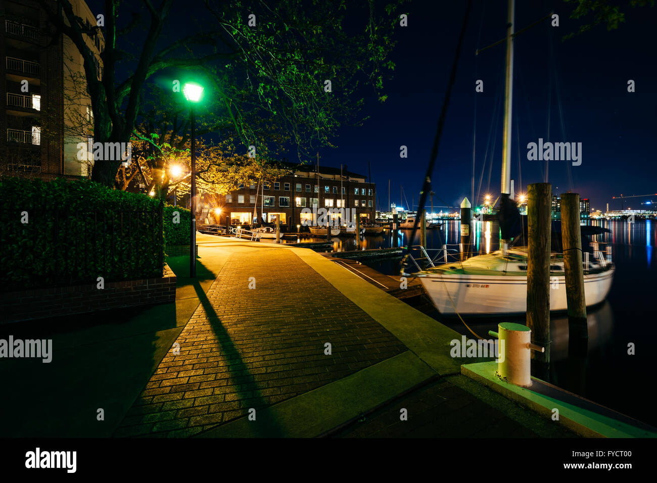 The waterfront at night, in Fells Point, Baltimore, Maryland Stock ...