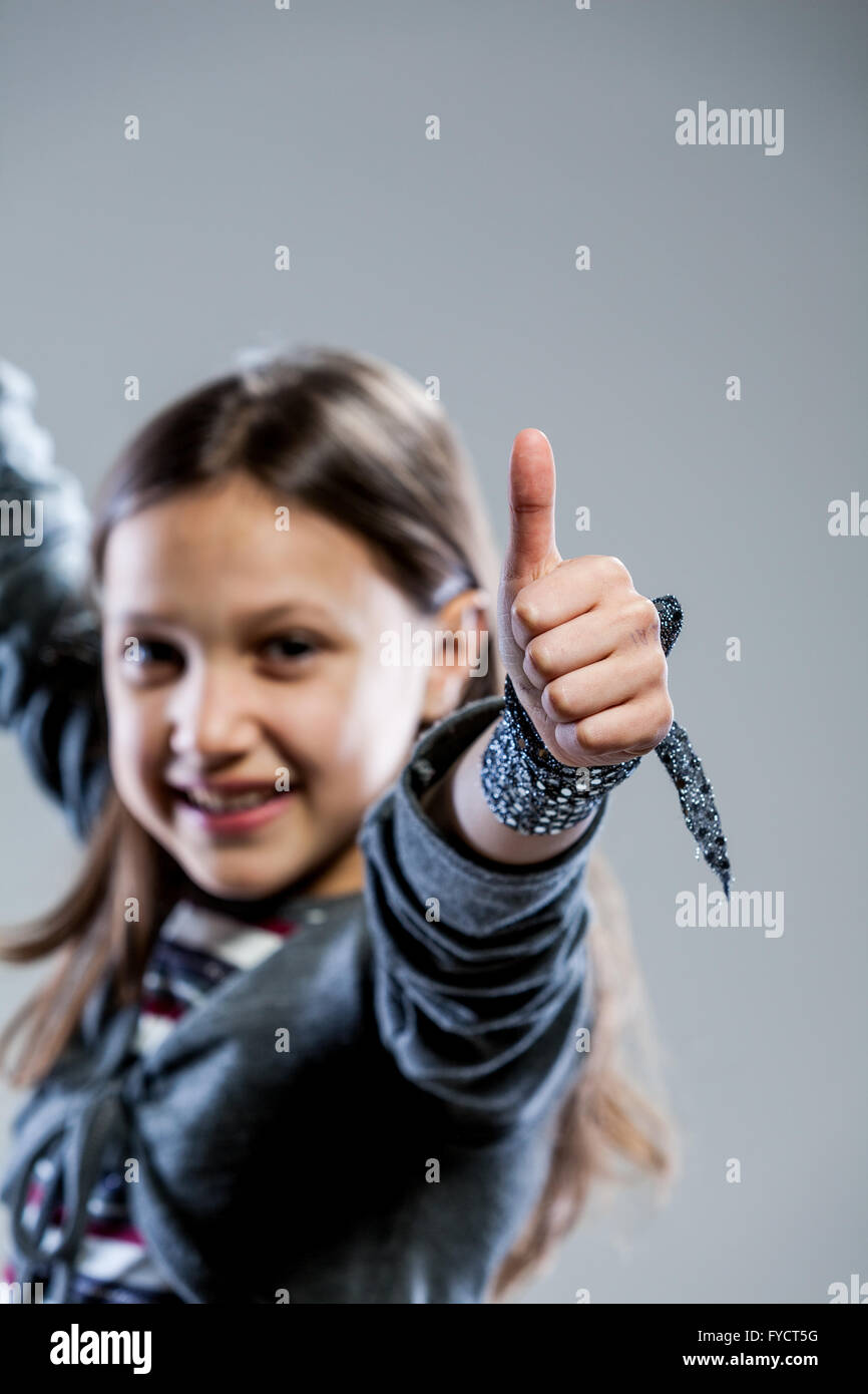 I'm the one says this girl rising up her thumb Stock Photo - Alamy