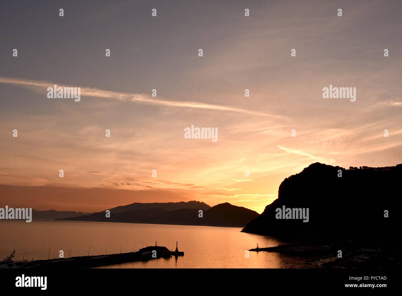 Sunset over the harbor on Capri island, Italy Stock Photo - Alamy
