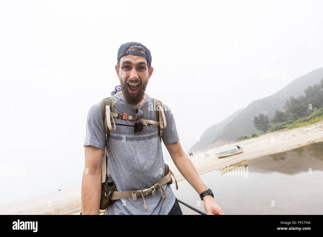 Young adults go hiking and camping in Tai Long Wan, next to Ham Tim ...