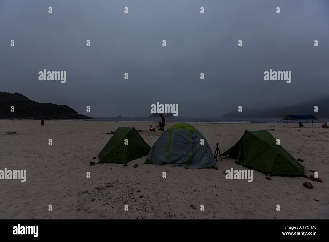 Young adults go hiking and camping in Tai Long Wan, next to Ham Tim ...