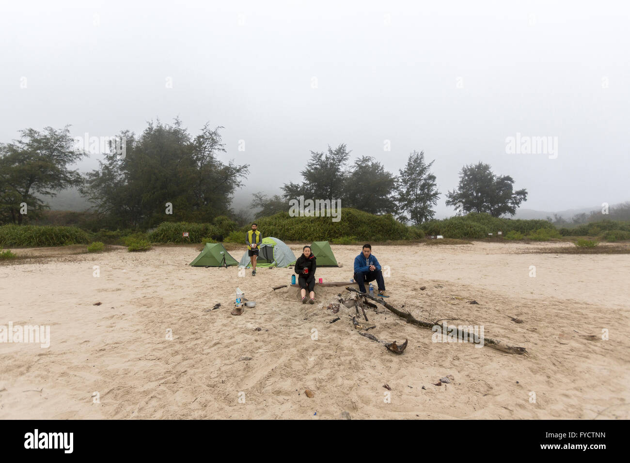 Young adults go hiking and camping in Tai Long Wan, next to Ham Tim ...