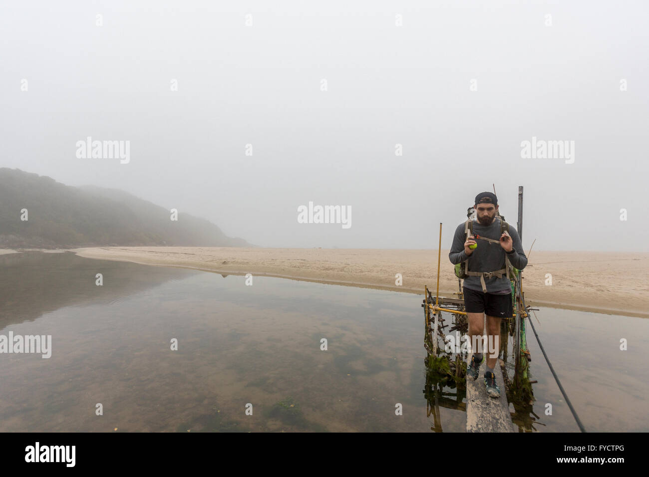 Young adults go hiking and camping in Tai Long Wan, next to Ham Tim ...