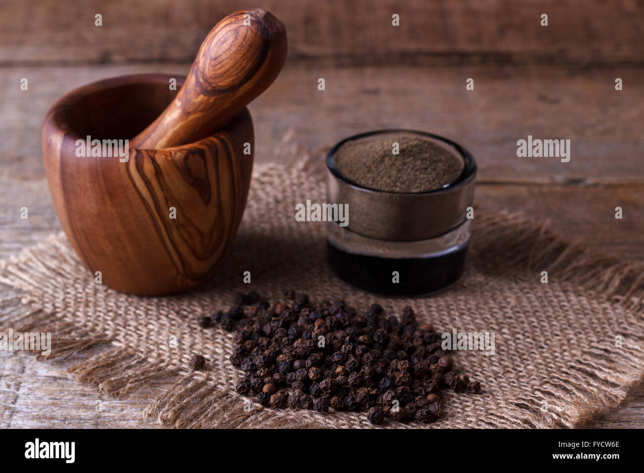 Black pepper corns and Black pepper Powder on wooden background Stock ...
