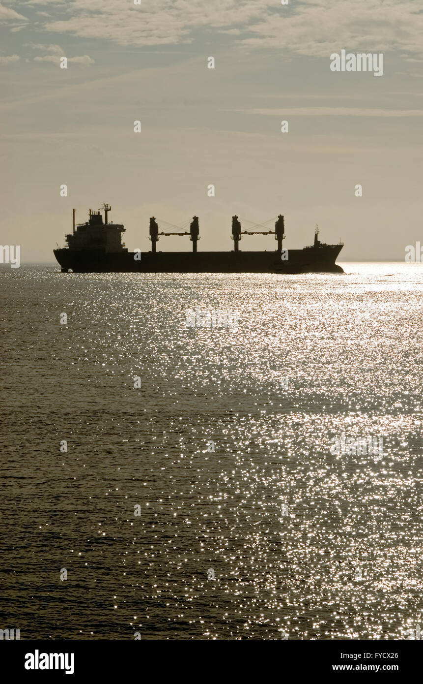 ship cruising on North Sea by sundown light Stock Photo - Alamy