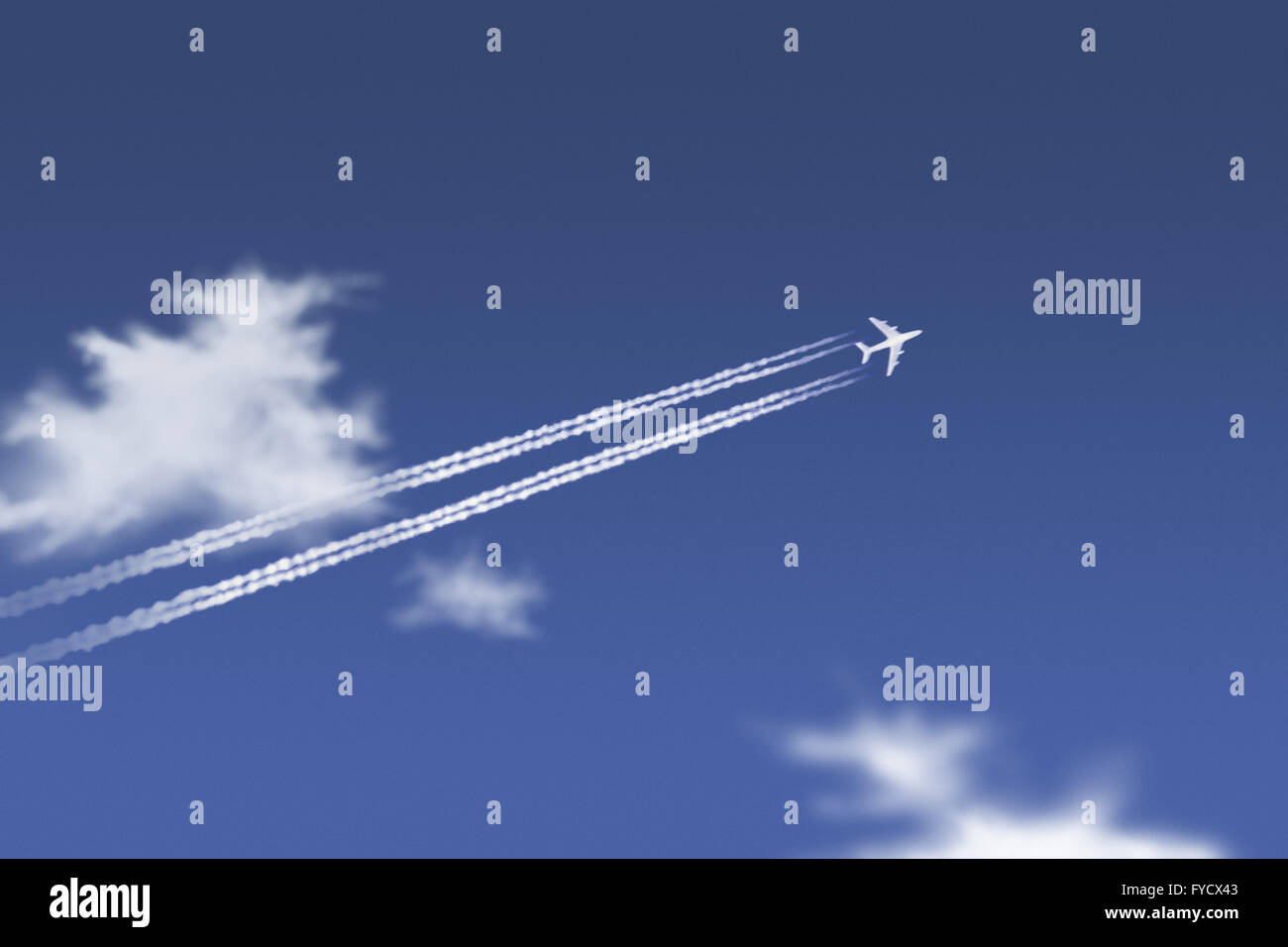 Aircraft with contrails Stock Photo - Alamy