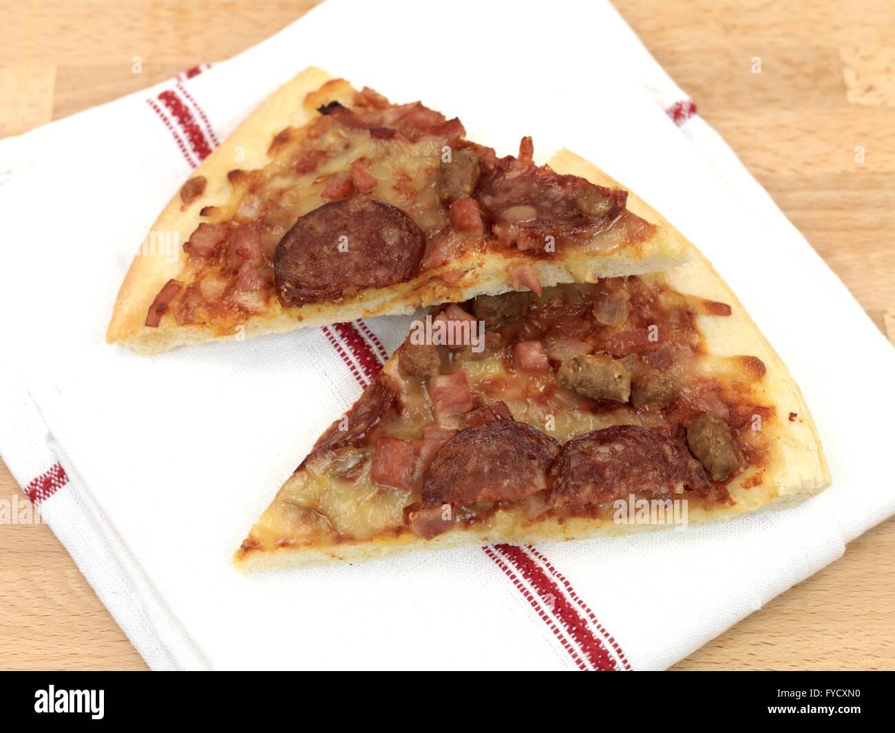 Freshly cooked takeaway pizza on a kitchen bench Stock Photo - Alamy