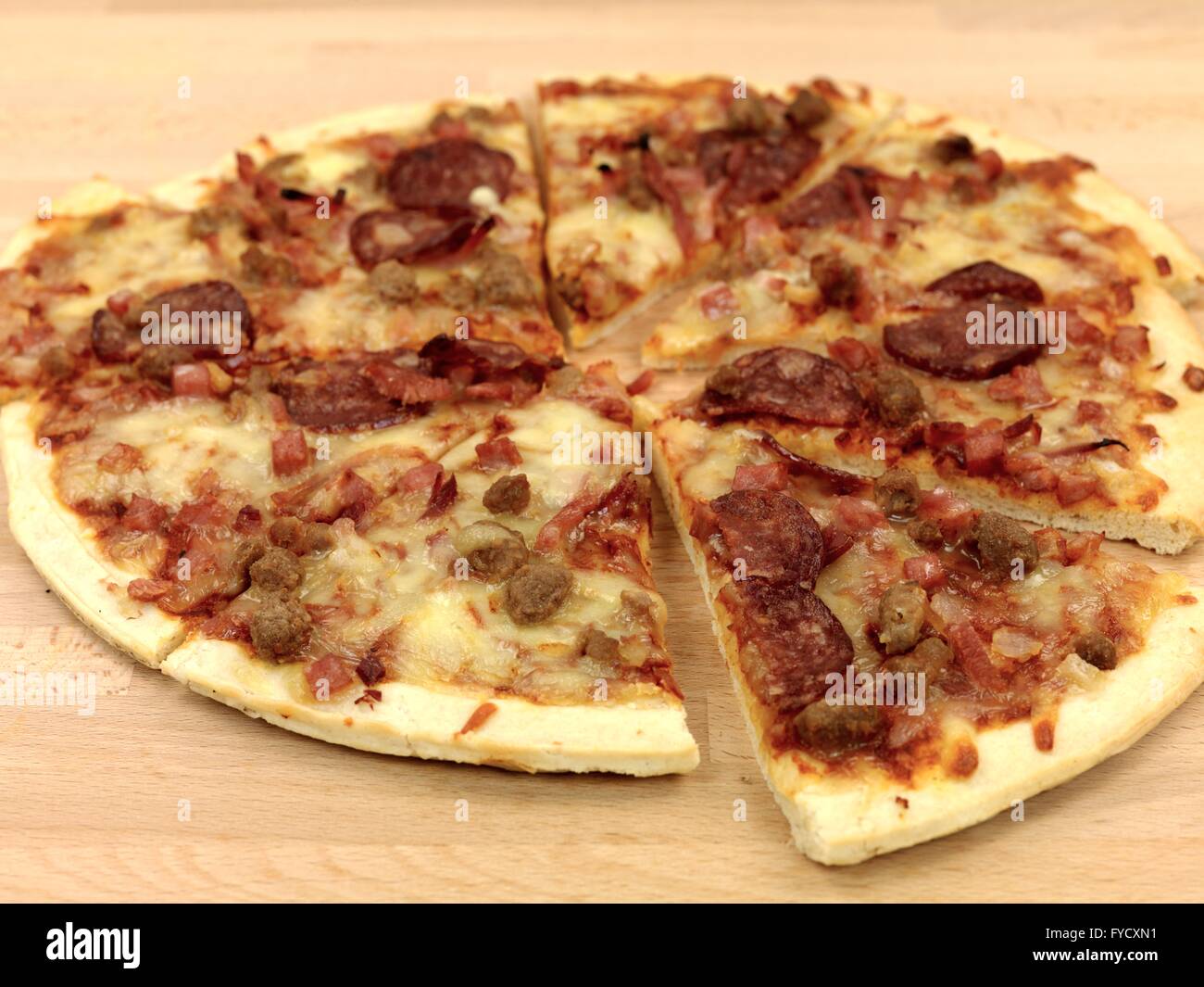 Freshly cooked takeaway pizza on a kitchen bench Stock Photo - Alamy