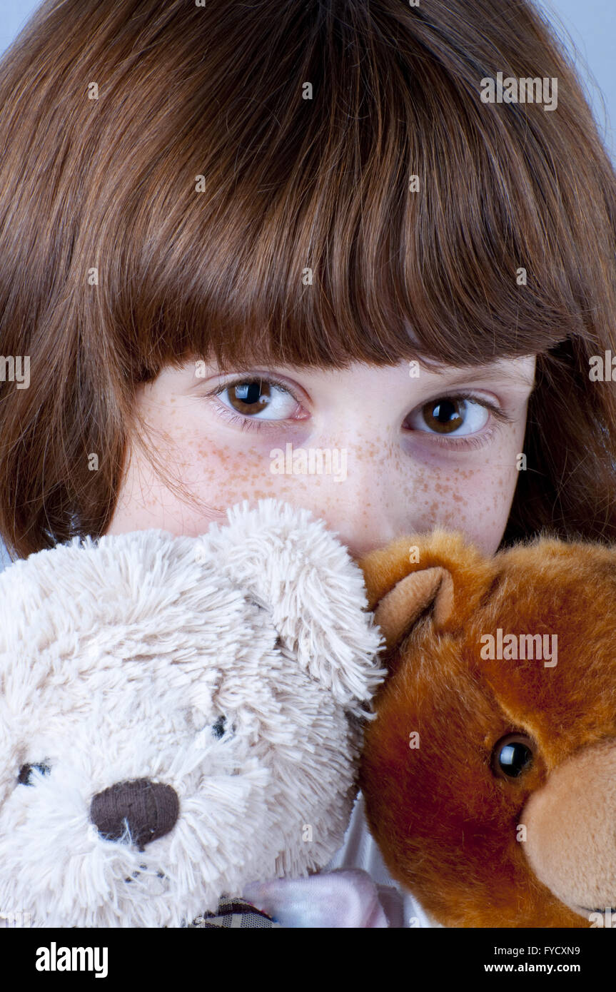 Picture of a young with freckles playing games Stock Photo - Alamy