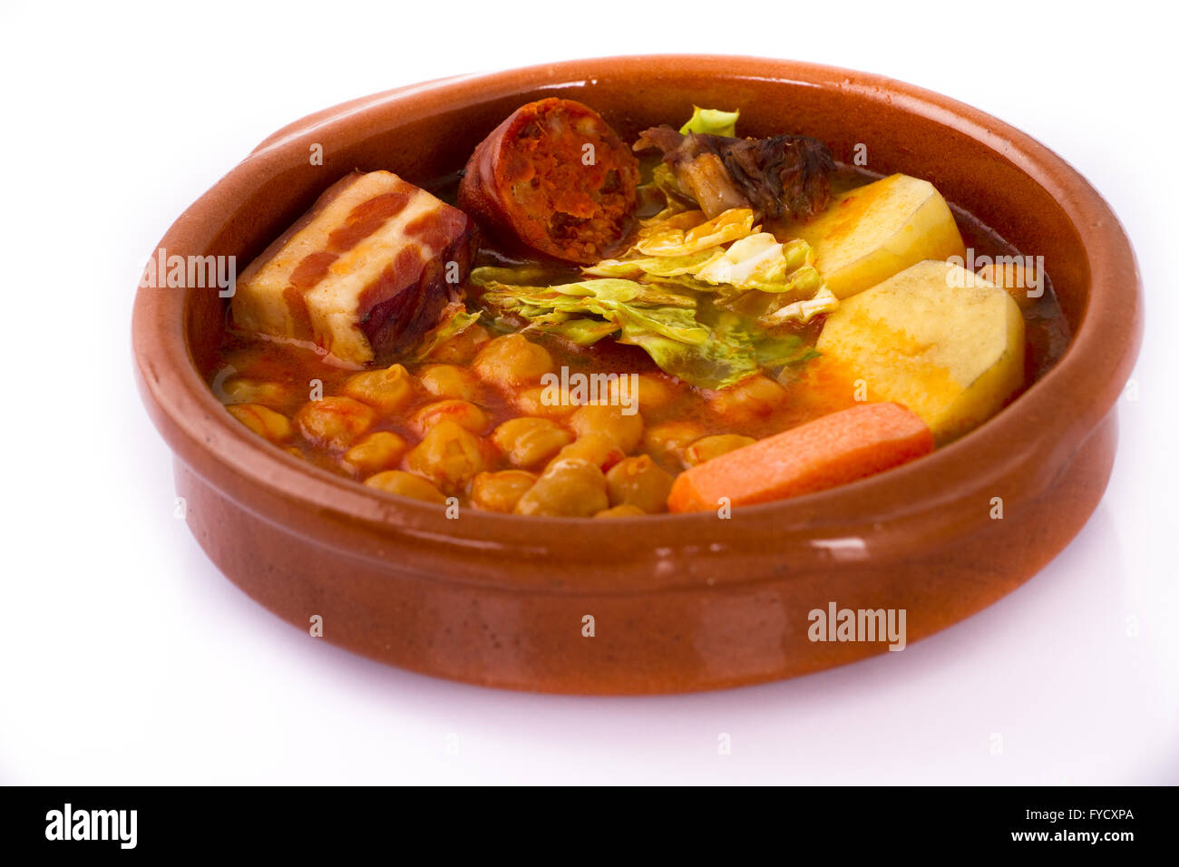 Madrid stew on earthenware pot, spanish food Stock Photo - Alamy
