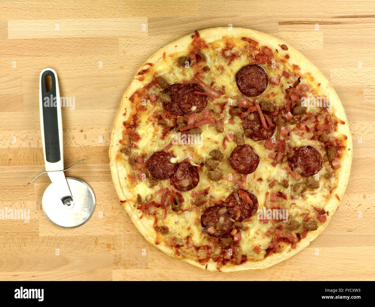 Freshly cooked takeaway pizza on a kitchen bench Stock Photo - Alamy