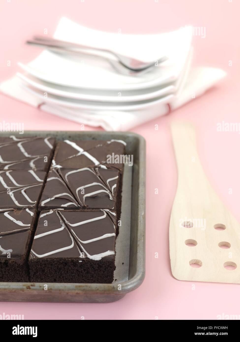 Chocolate mud cake slices isolated against a pink background Stock ...