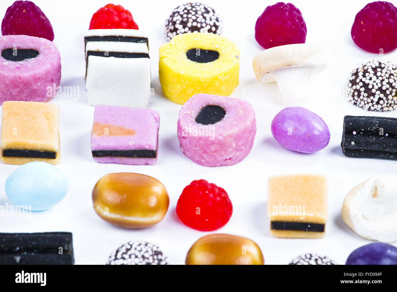 Many candy on white background.Candy colors Stock Photo - Alamy