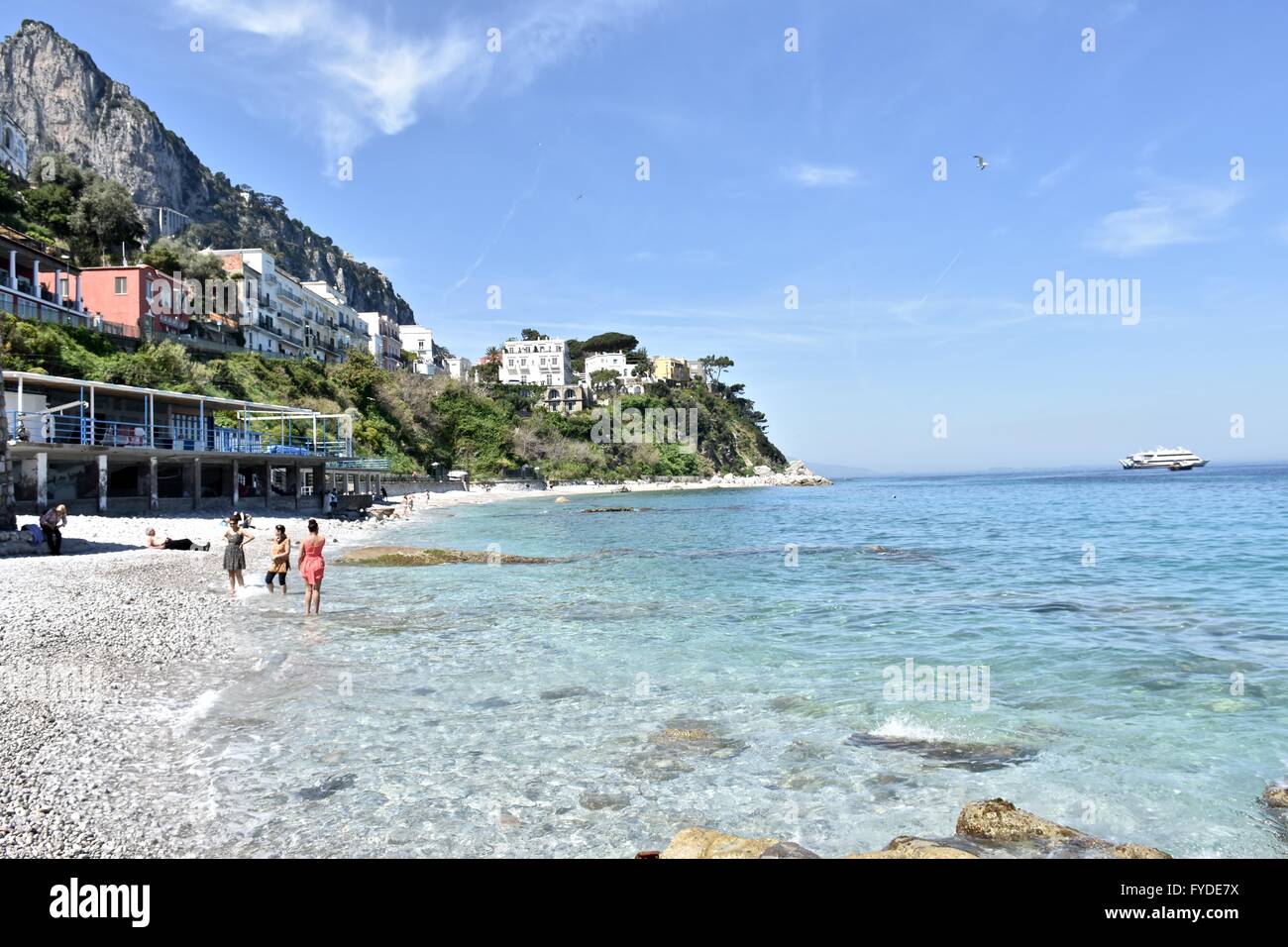 Tourists playing on the beach of Capri island, Italy Stock Photo - Alamy