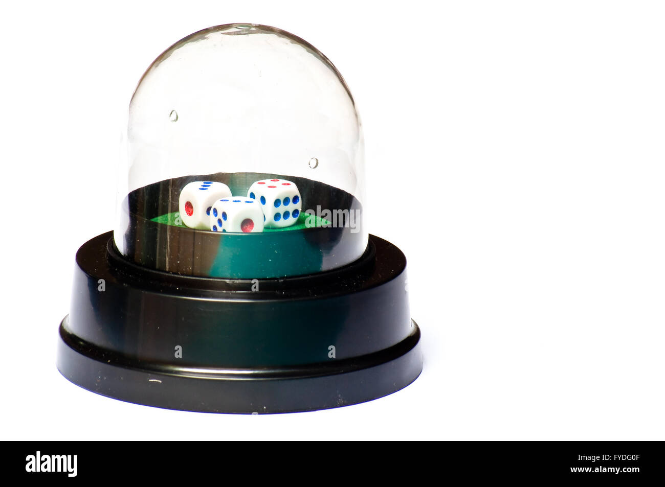 Glass dome dice shaker, with three dice inside, on white background ...