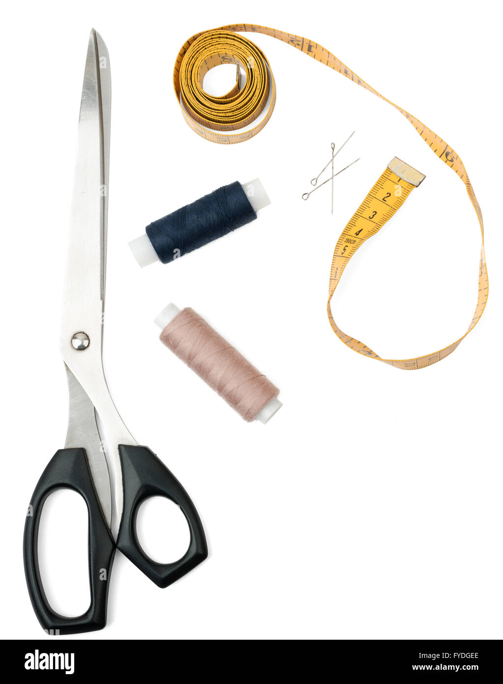 Tailors tools - scissors, thread and tape measure Stock Photo - Alamy