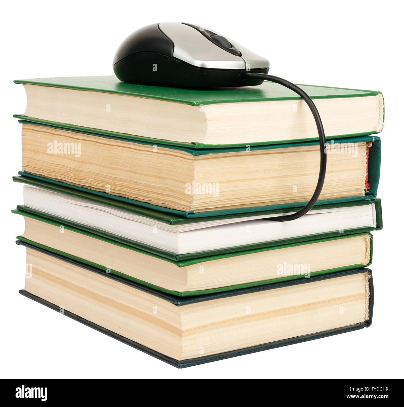 Stack of books with computer mouse on top Stock Photo - Alamy