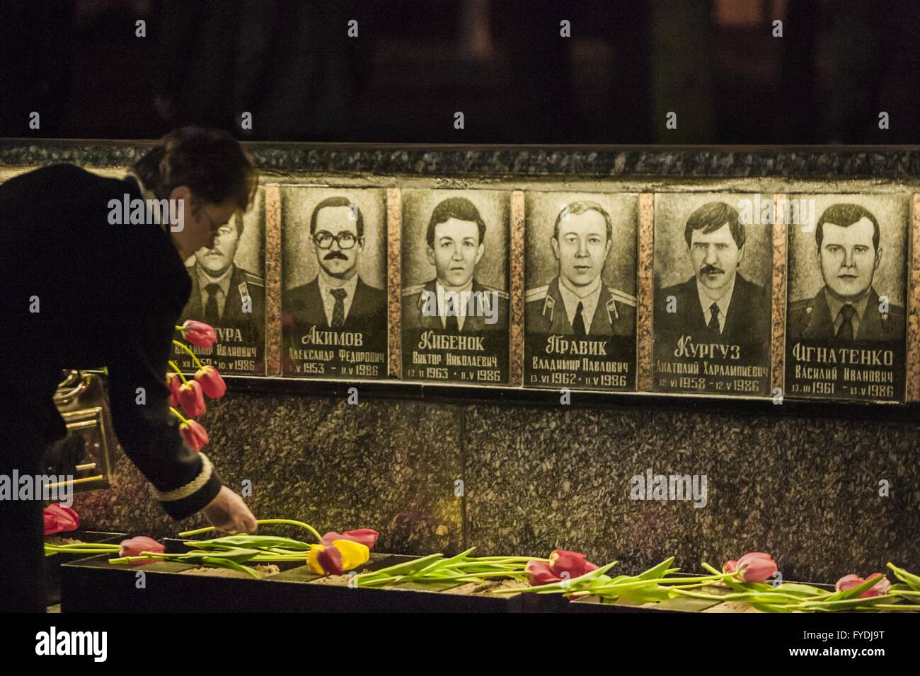 Slavutych, Kiev, Ukraine. 25th Apr, 2016. Woman lays flowers at the ...