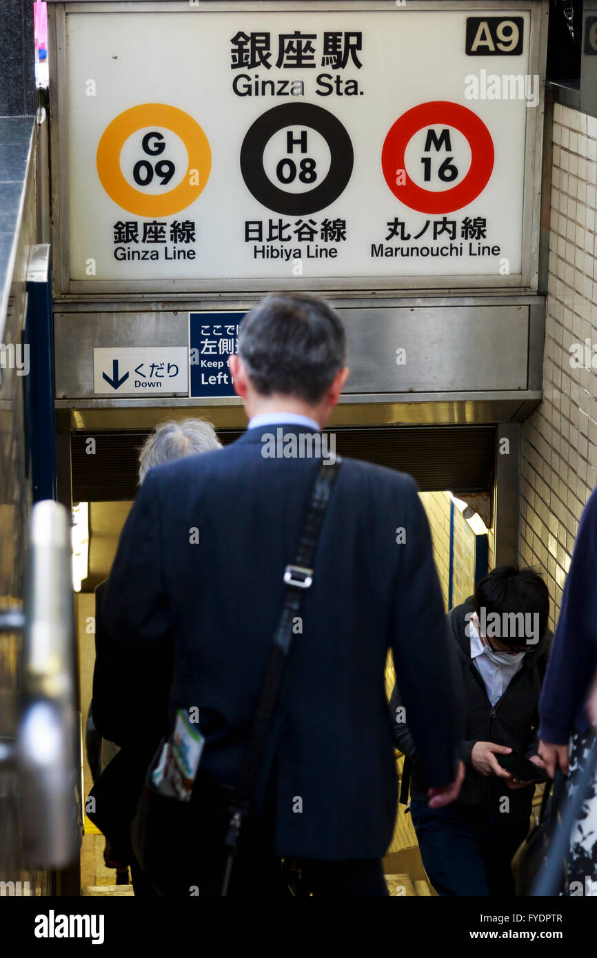 Tokyo, Japan. 26th April, 2016. Tokyo Metro commuters walk below a ...