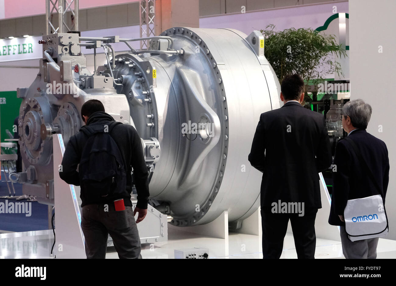 Hanover, Germany. 26th Apr, 2016. Visitors looking at a wind mill gear ...