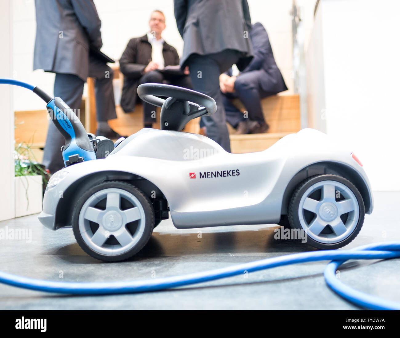 Hanover, Germany. 26th Apr, 2016. A charging cable for electric ...