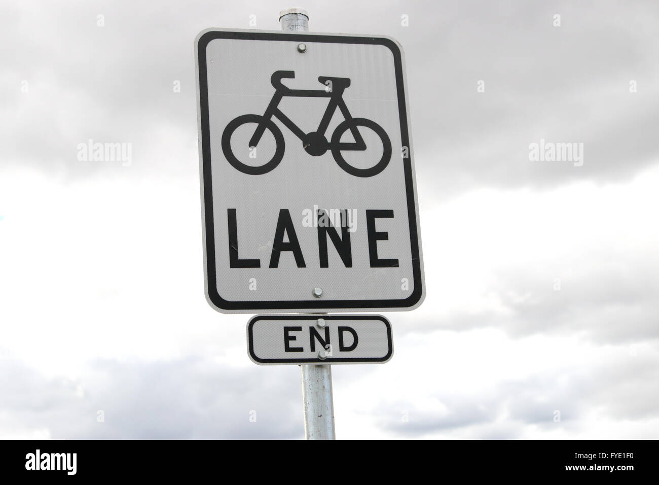 Bicycle lane signboard Stock Photo - Alamy